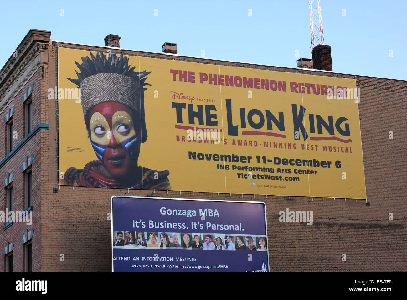 The Lion King Musical advertisement displayed on the side of a brick ...