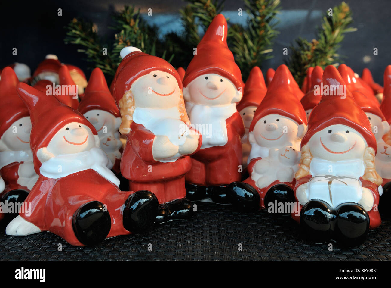 Small Santa Clauses waiting to be bought and brought home to a nice ...