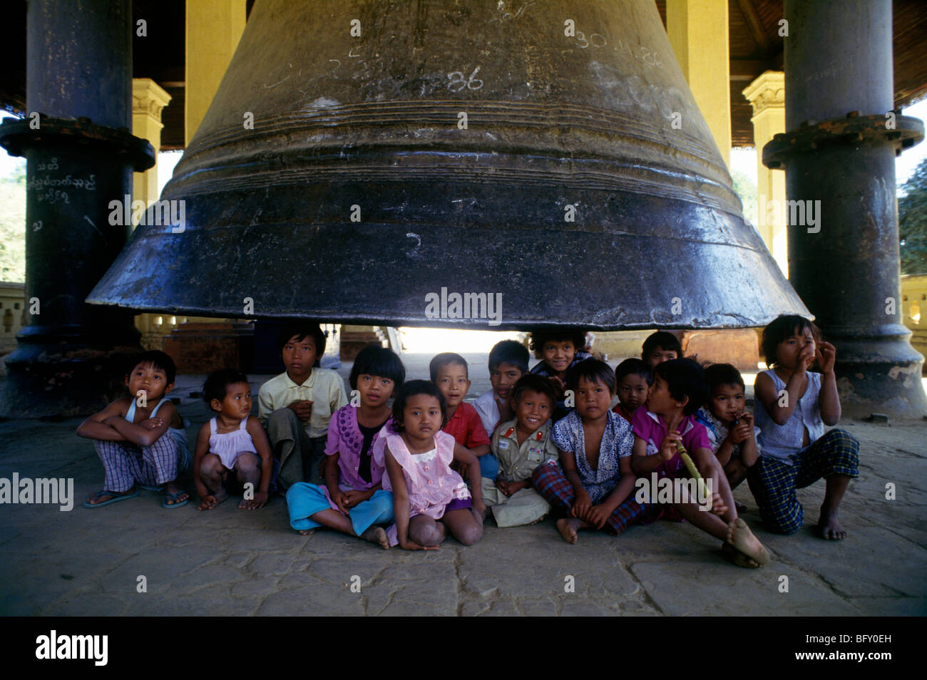 Children ringing bells hi-res stock photography and images - Alamy