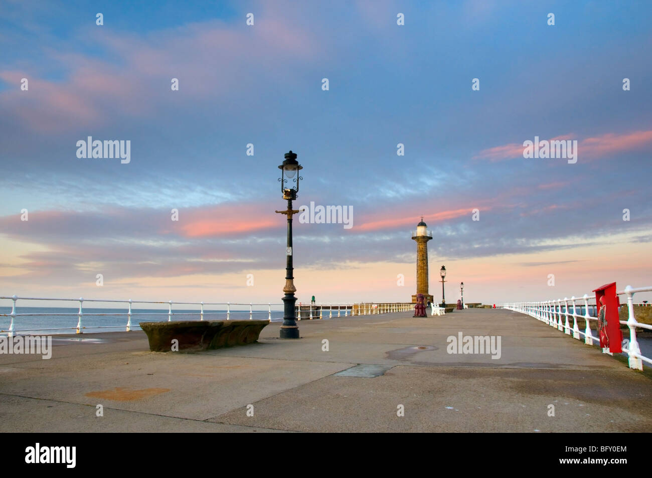 Whitby pier at sunset Stock Photo - Alamy
