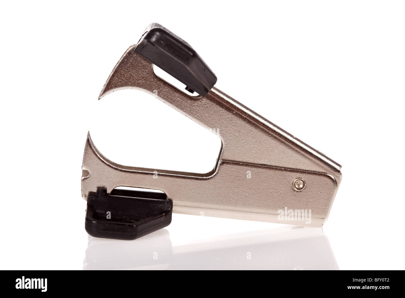 Staple remover isolated on a white background Stock Photo - Alamy