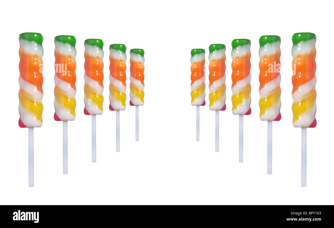 Ten lollipop sticks in a perspective disposition over white background ...