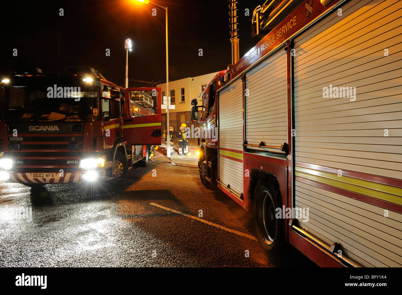 Sayers Factory on fire at night with fire service engine Stock Photo ...
