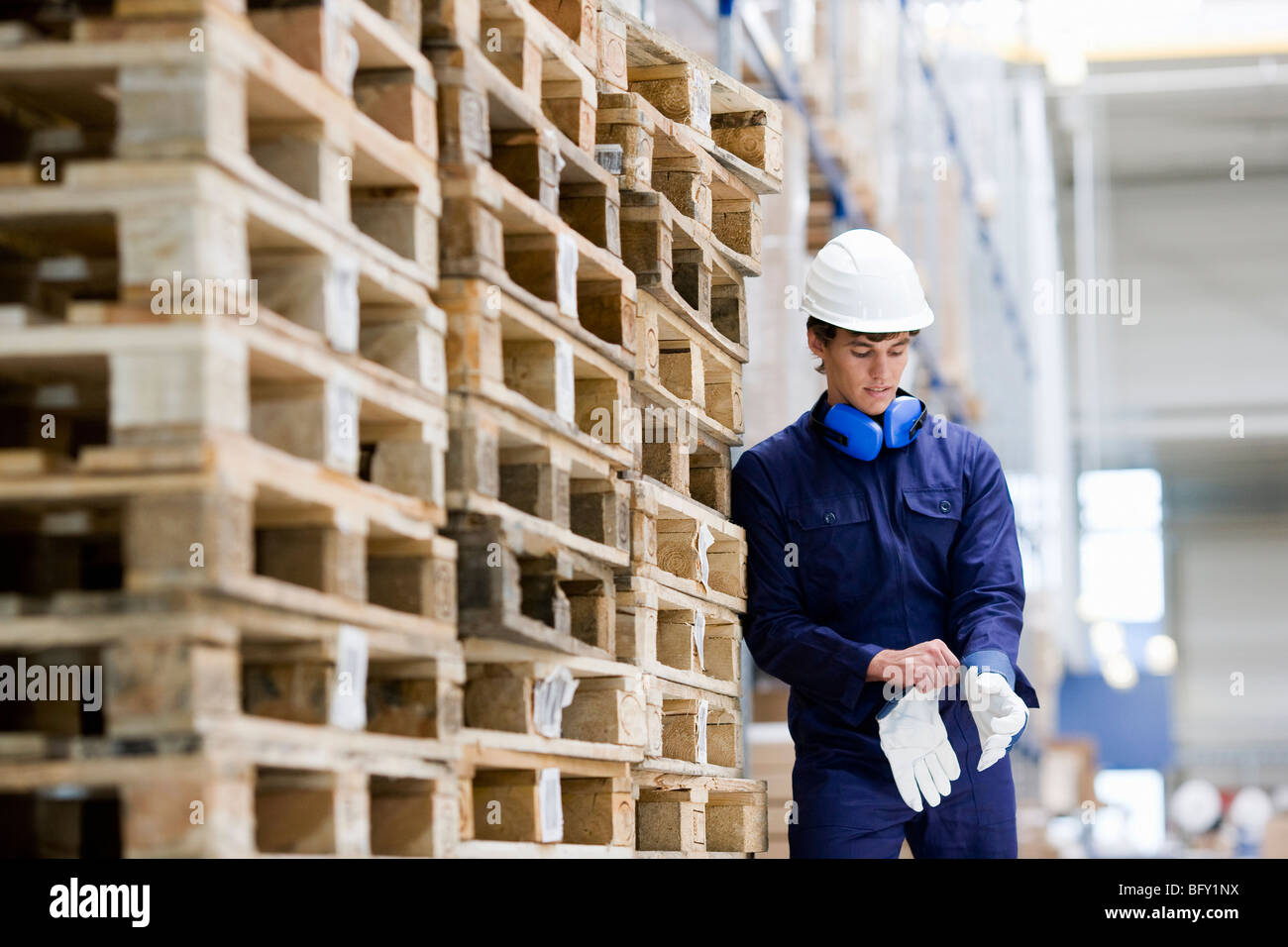 workman in storage Stock Photo - Alamy