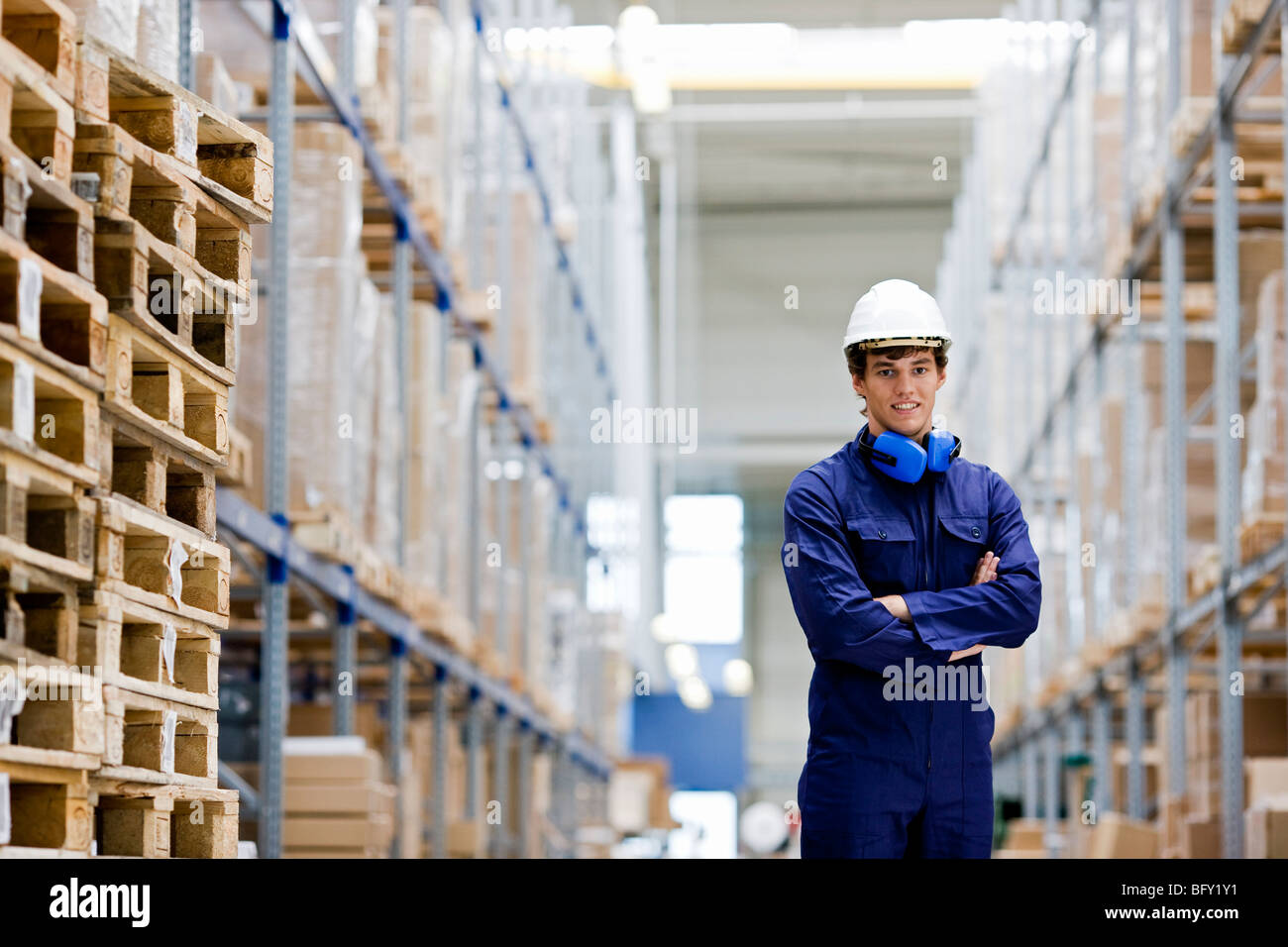 workman in storage Stock Photo - Alamy