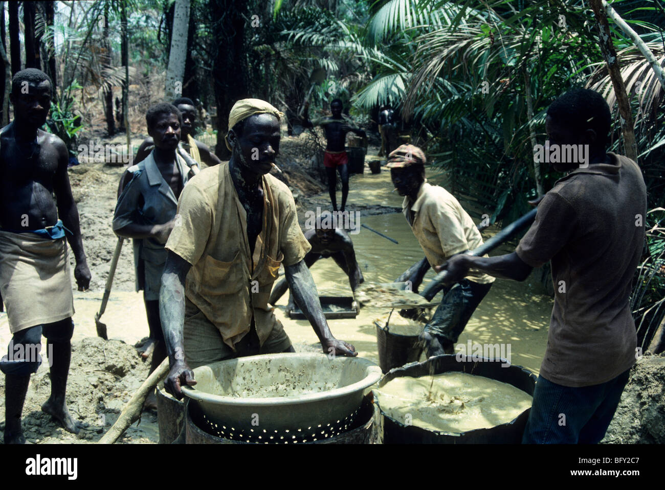 Sieving and panning for gold and diamonds in Ghana Stock Photo - Alamy