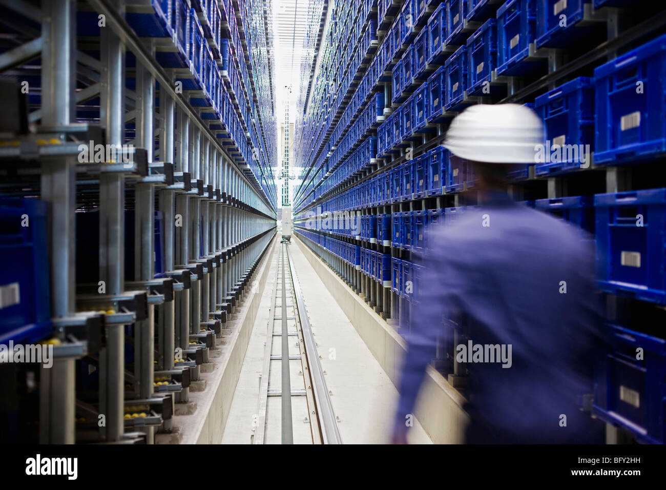 workman in storage Stock Photo - Alamy