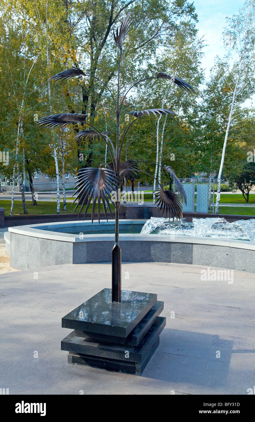 forged figure of palm-tree in public "Park of forged figures" in center ...