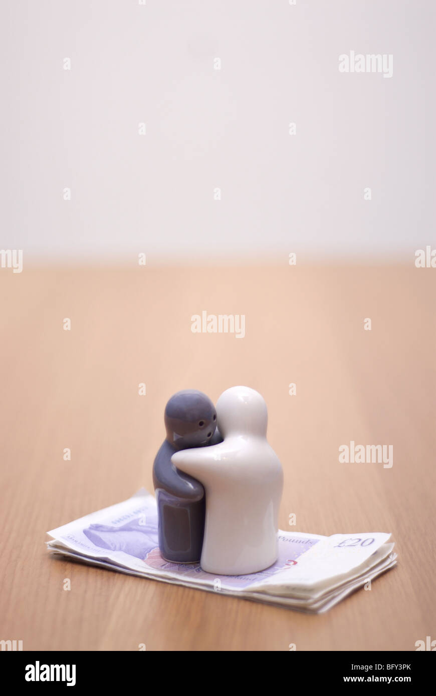 Figures hugging hi-res stock photography and images - Alamy