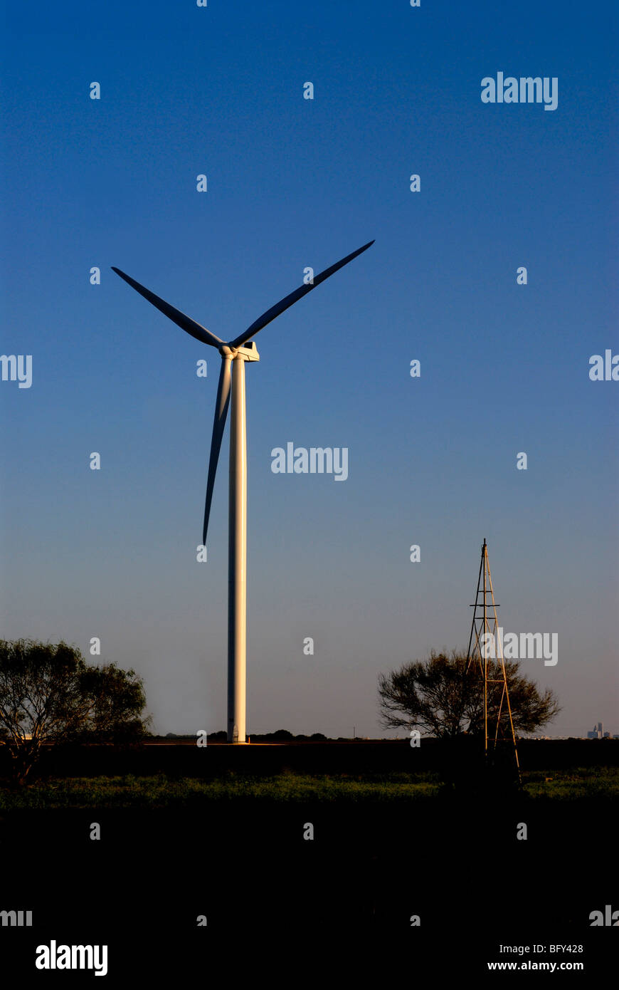 Wind generator and old style windmill that was used for pumping water ...