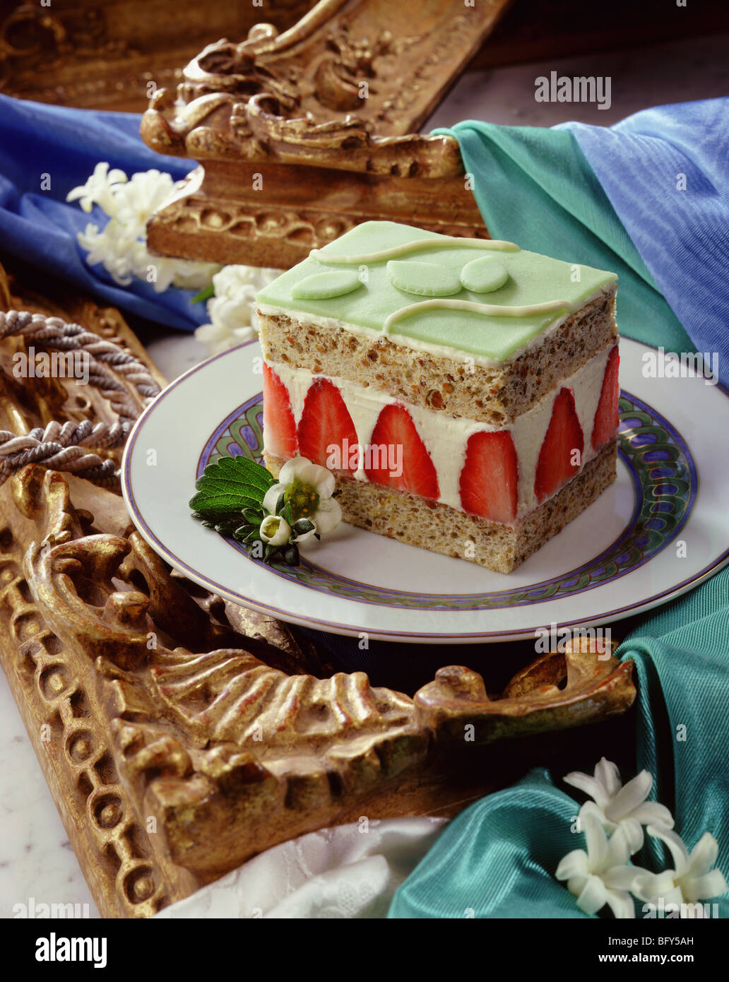 Strawberry creme layer cake with marzipan Stock Photo - Alamy