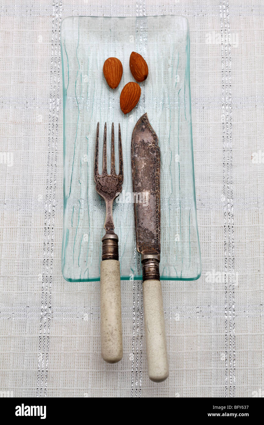 old classic dirty fork knife Stock Photo - Alamy