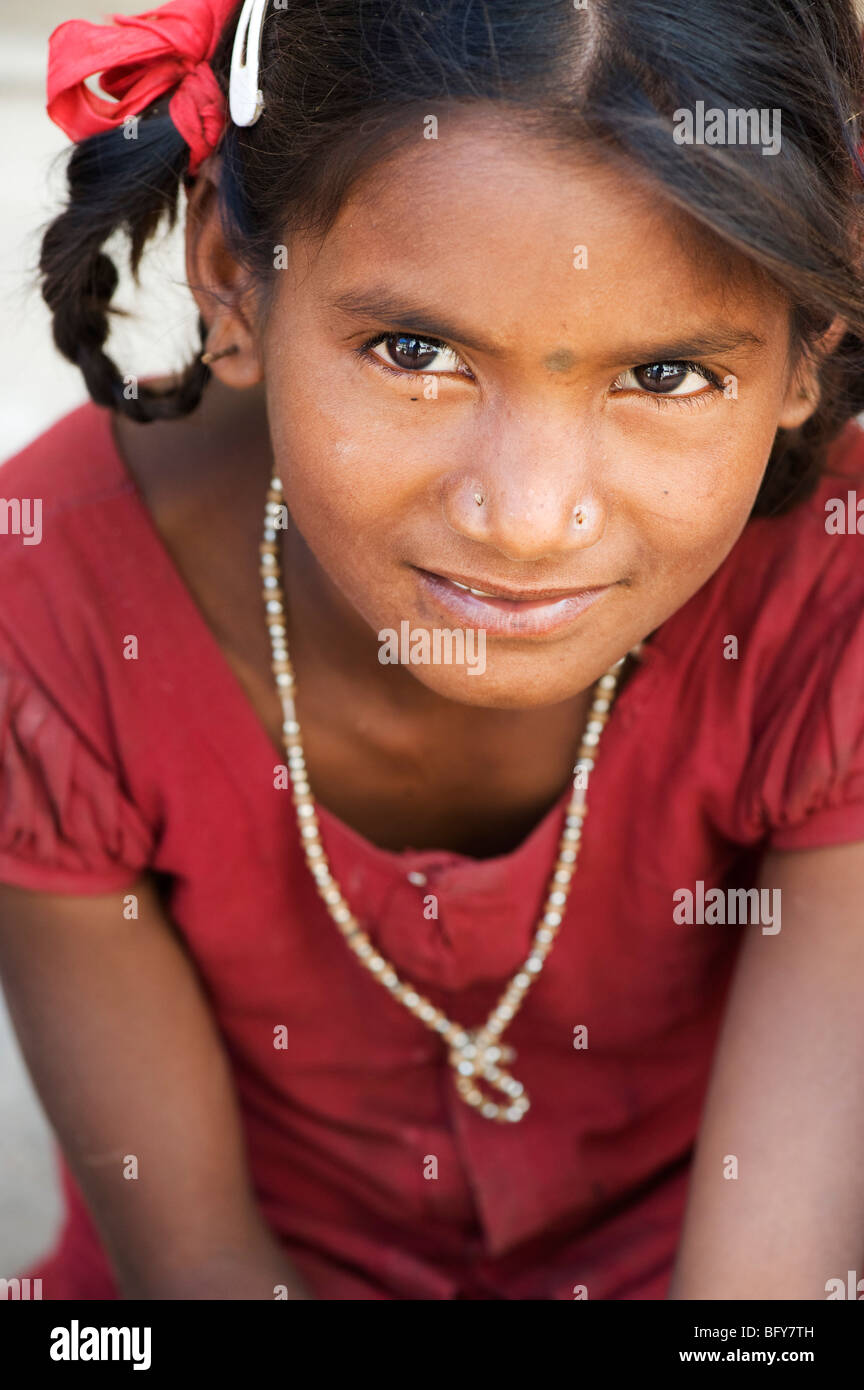 Poor indian street girl staring selective focus Stock Photo - Alamy