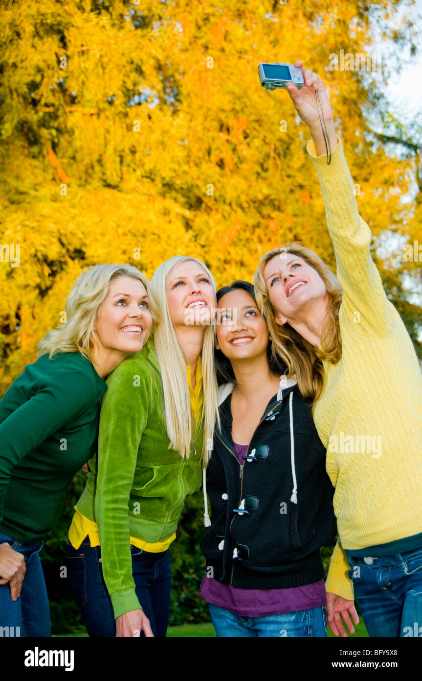 Women taking self-portrait with digital camera Stock Photo - Alamy