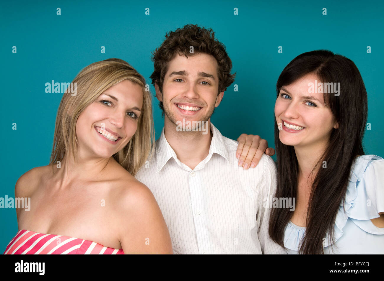 Man and women smiling Stock Photo - Alamy
