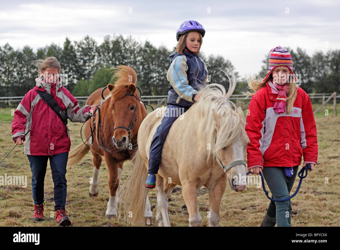 Woman riding white pony hi-res stock photography and images - Alamy