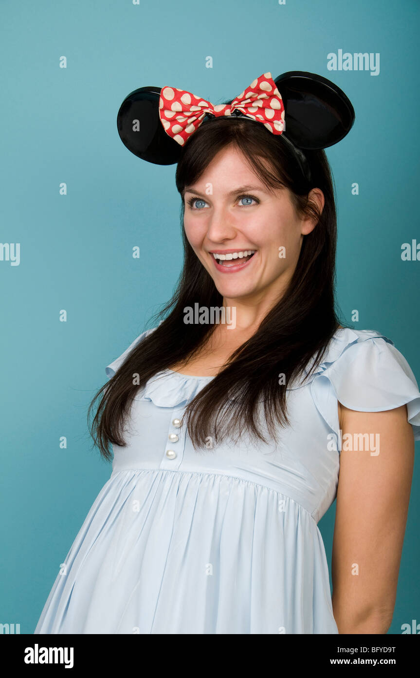 Woman wearing mouse ears hi-res stock photography and images - Alamy