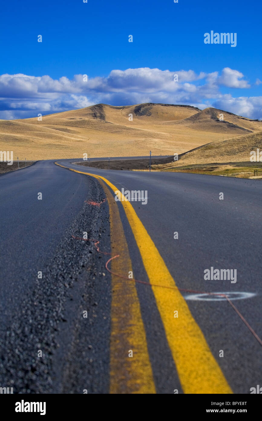 Highway Runs Towards Prairie Butte, Vertical, Montana, USA Stock Photo ...