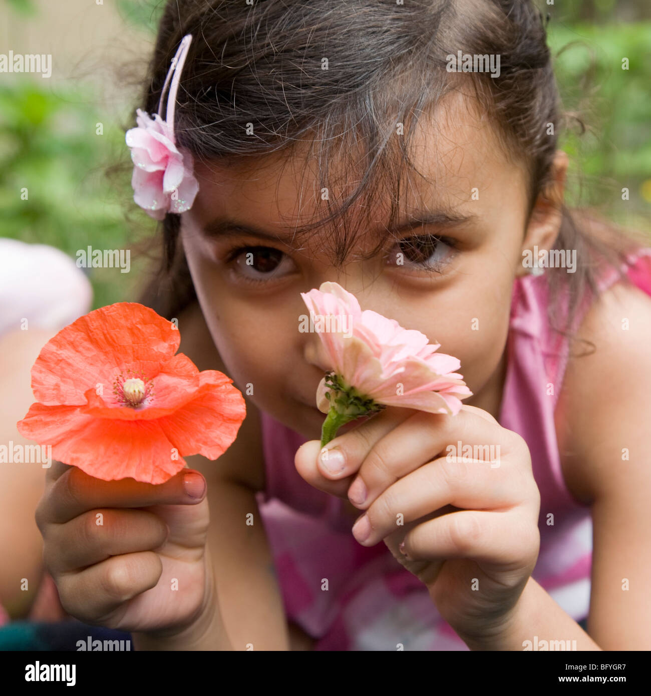 Child with flowers Stock Photo - Alamy