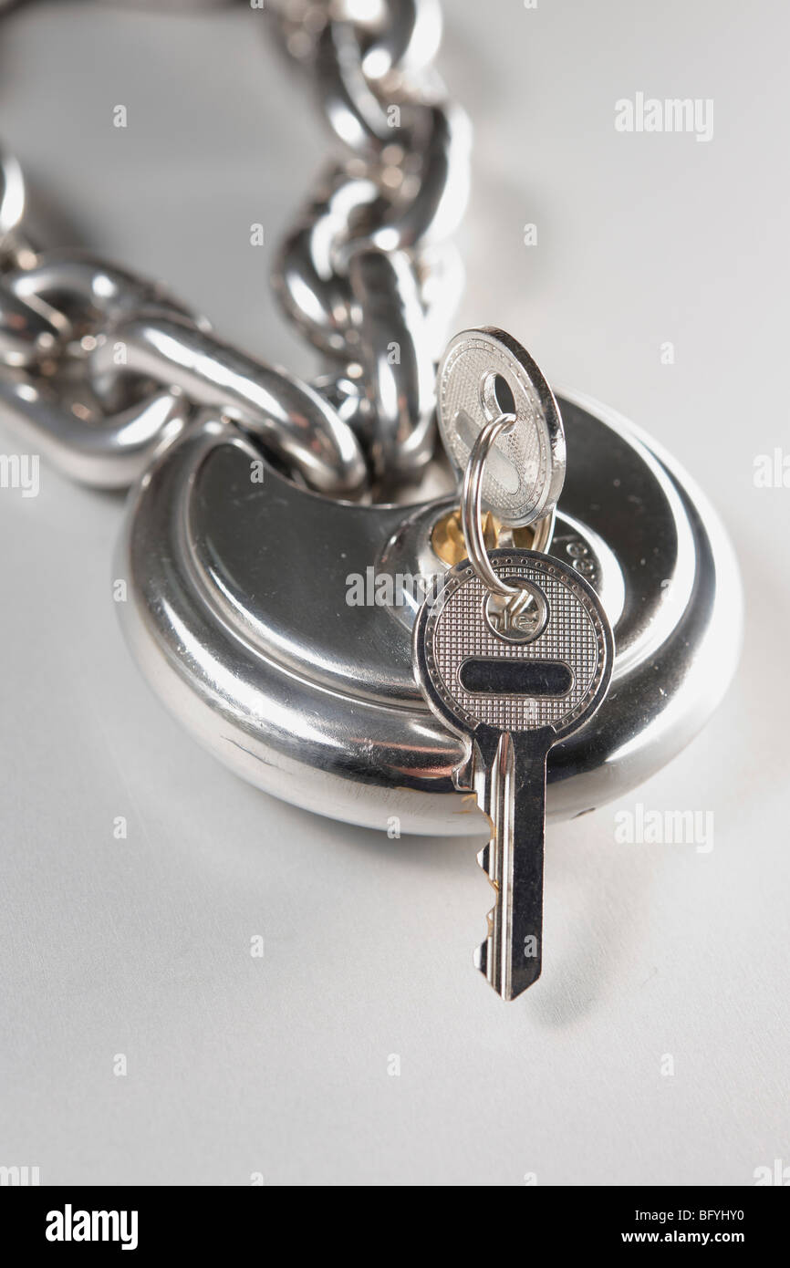 Stainless steel chain with padlock Stock Photo - Alamy