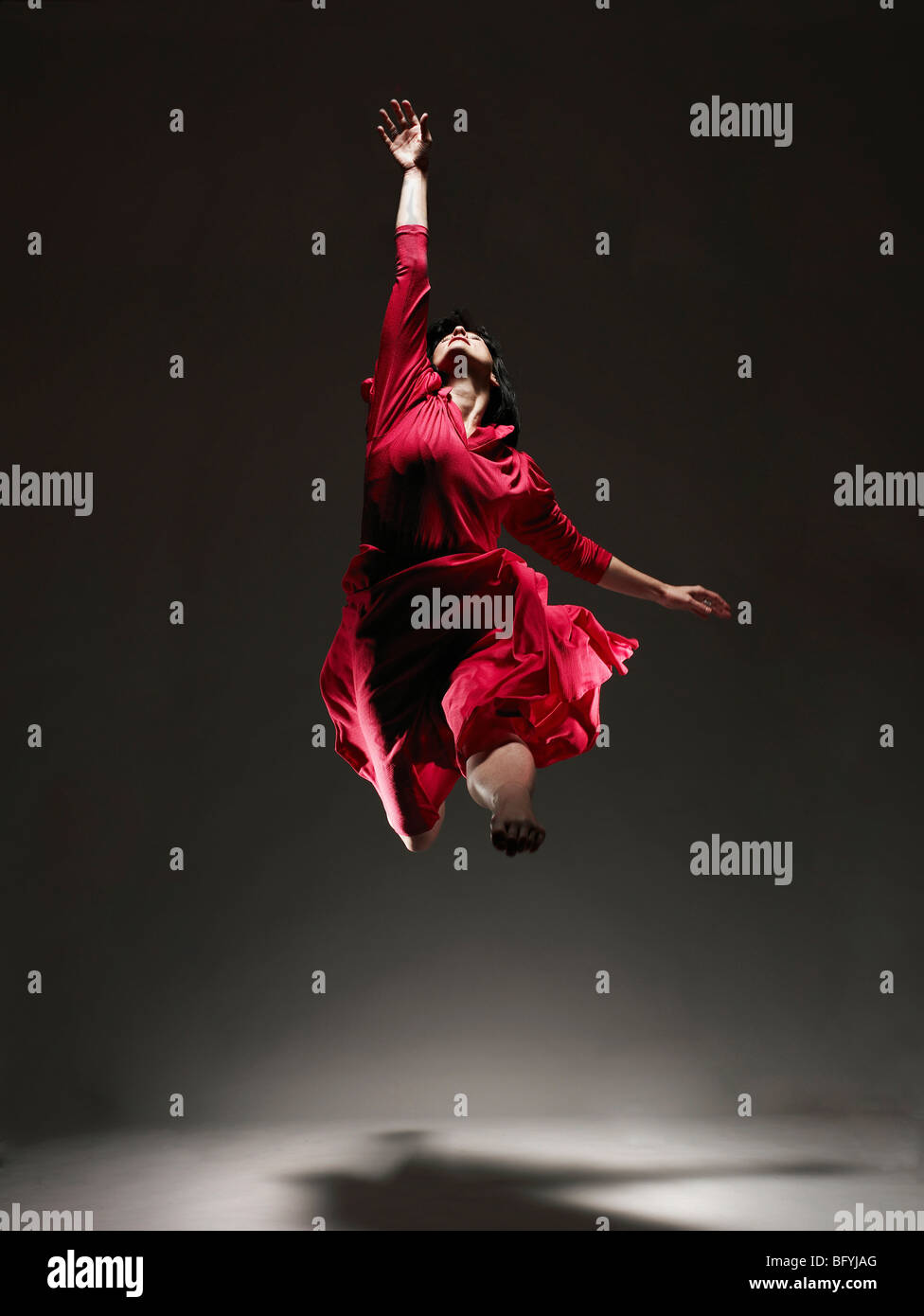 Women dancing jumping white dress hi-res stock photography and images ...