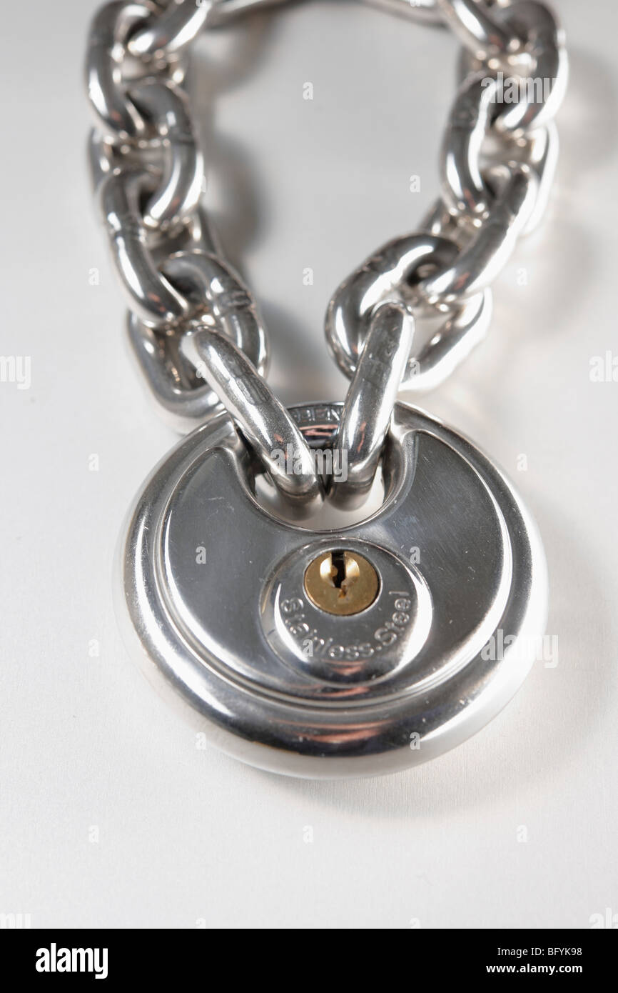 Stainless steel chain with padlock Stock Photo - Alamy