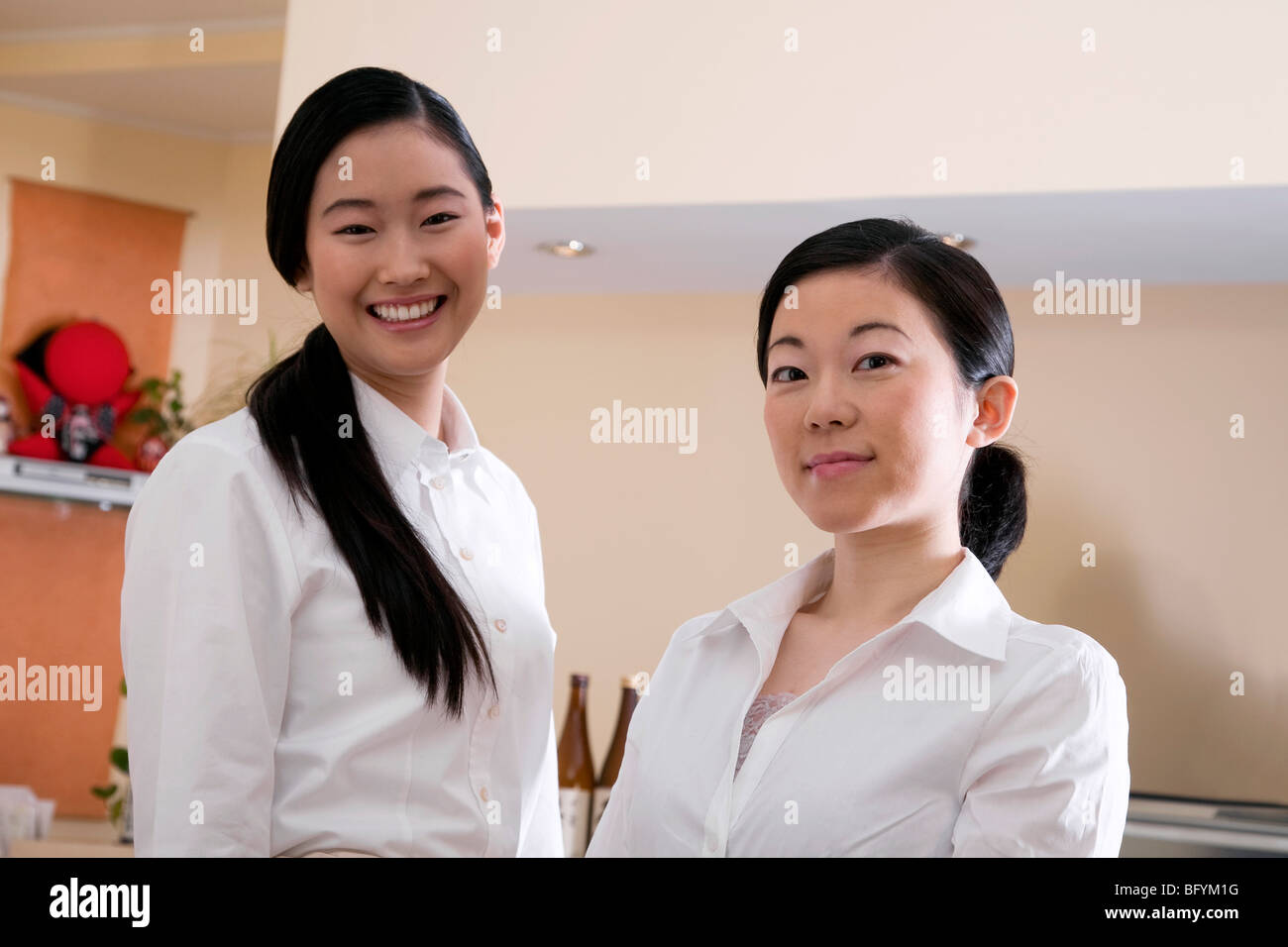 portrait of two japanese waitresses Stock Photo - Alamy