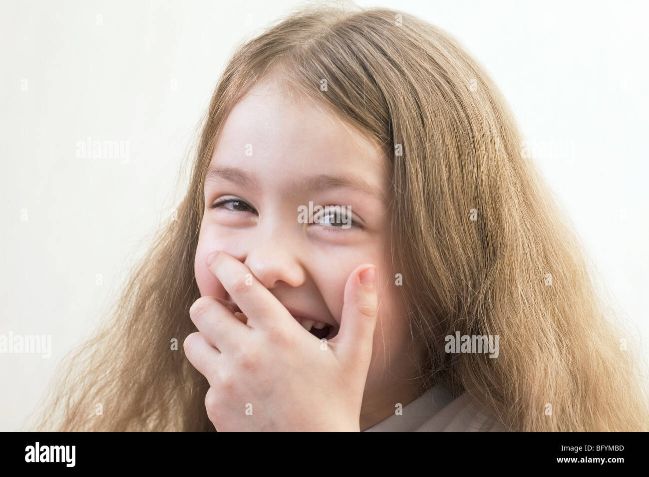 headshot of laughing young girl Stock Photo - Alamy
