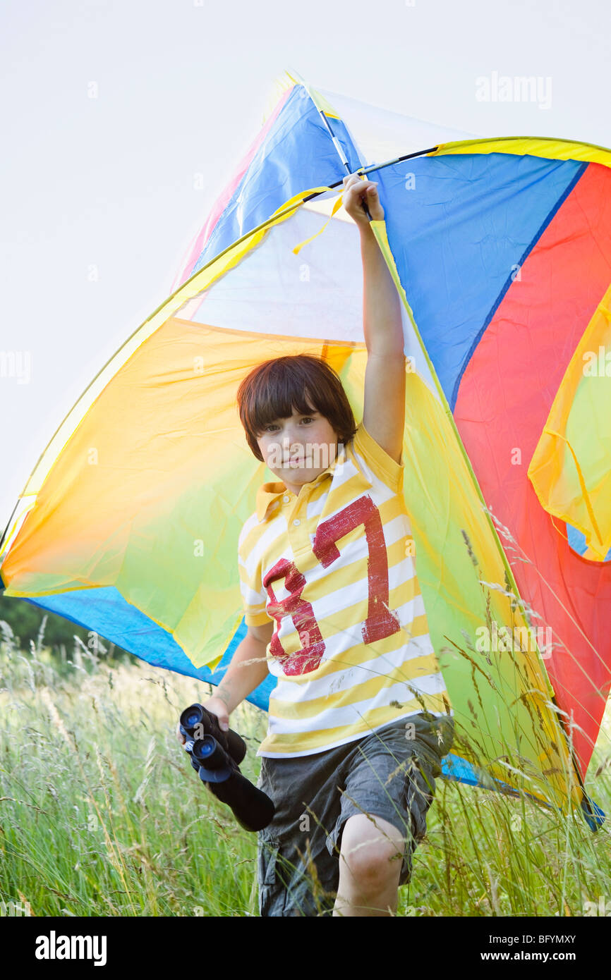 Boy With Kite and Binoculars Stock Photo - Alamy