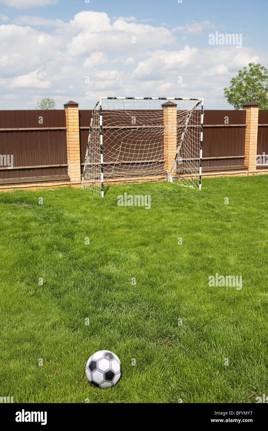 football pitch with ball and goal Stock Photo - Alamy