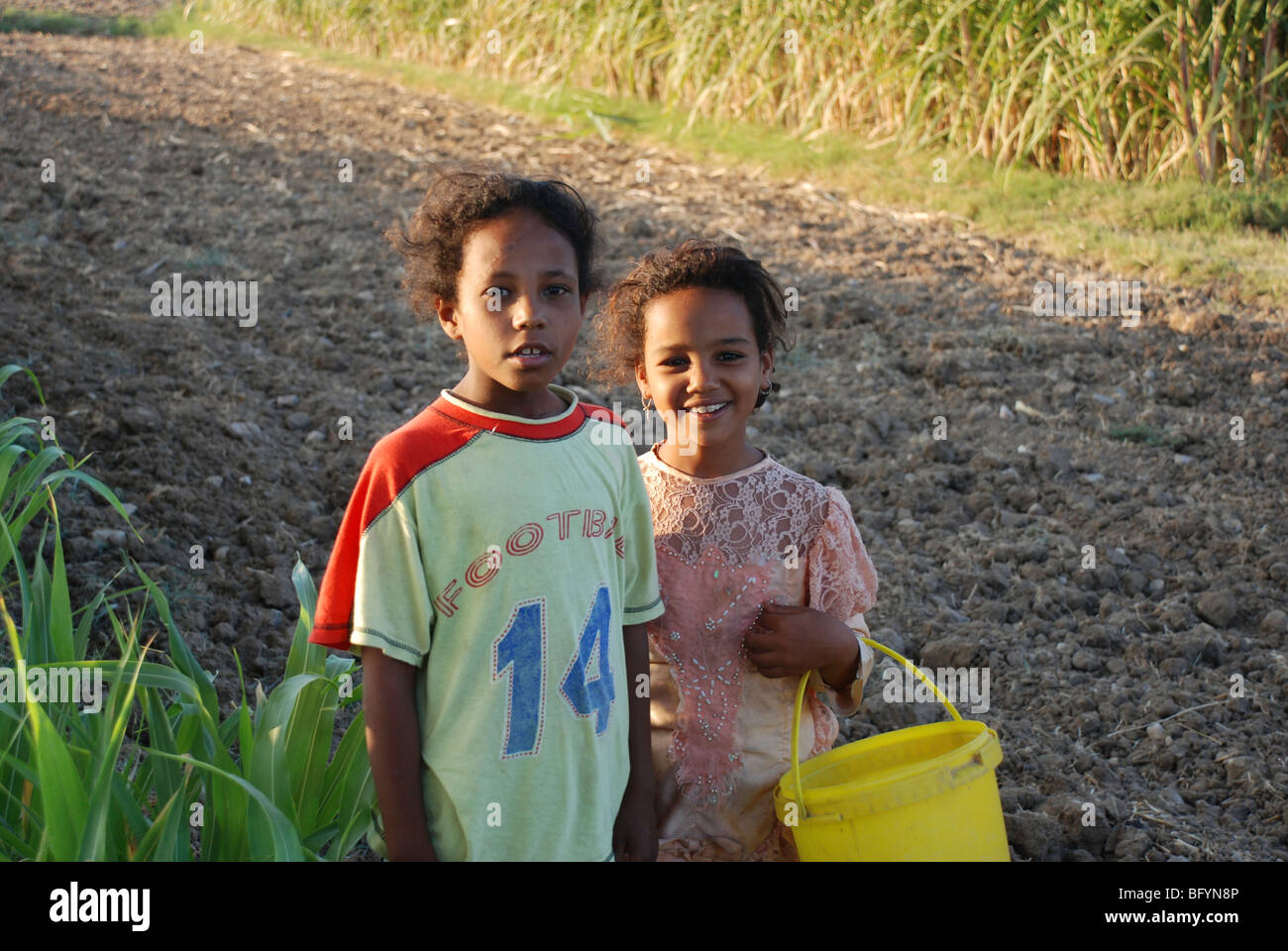 Two Girl Beggars Stock Photo - Alamy