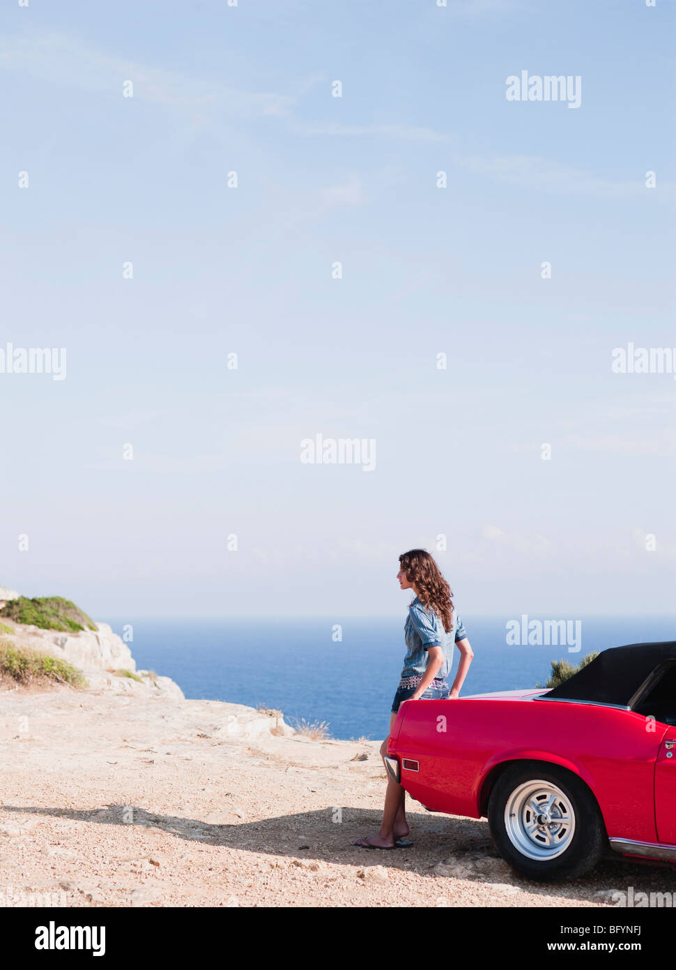 woman leaning at car Stock Photo - Alamy