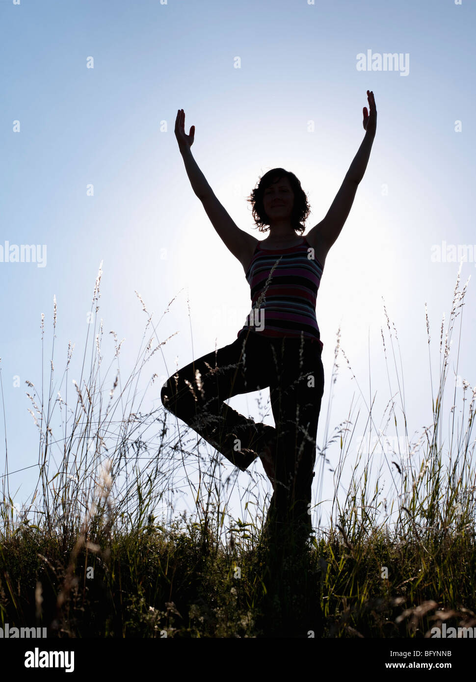 Woman In Yoga Pose Stock Photo - Alamy