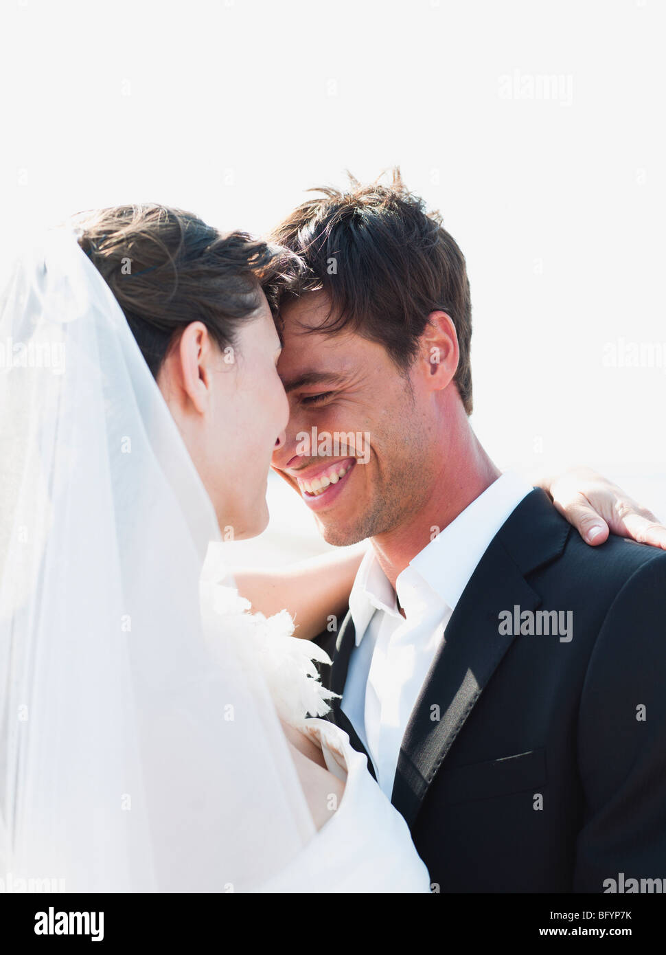 bride and groom laughing Stock Photo - Alamy