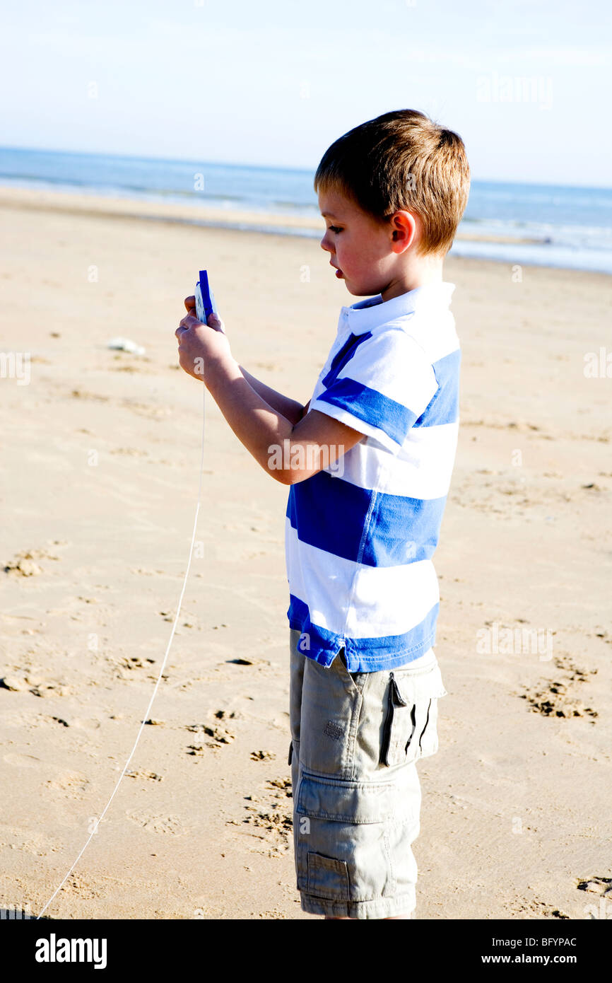 Kite string winding hi-res stock photography and images - Alamy
