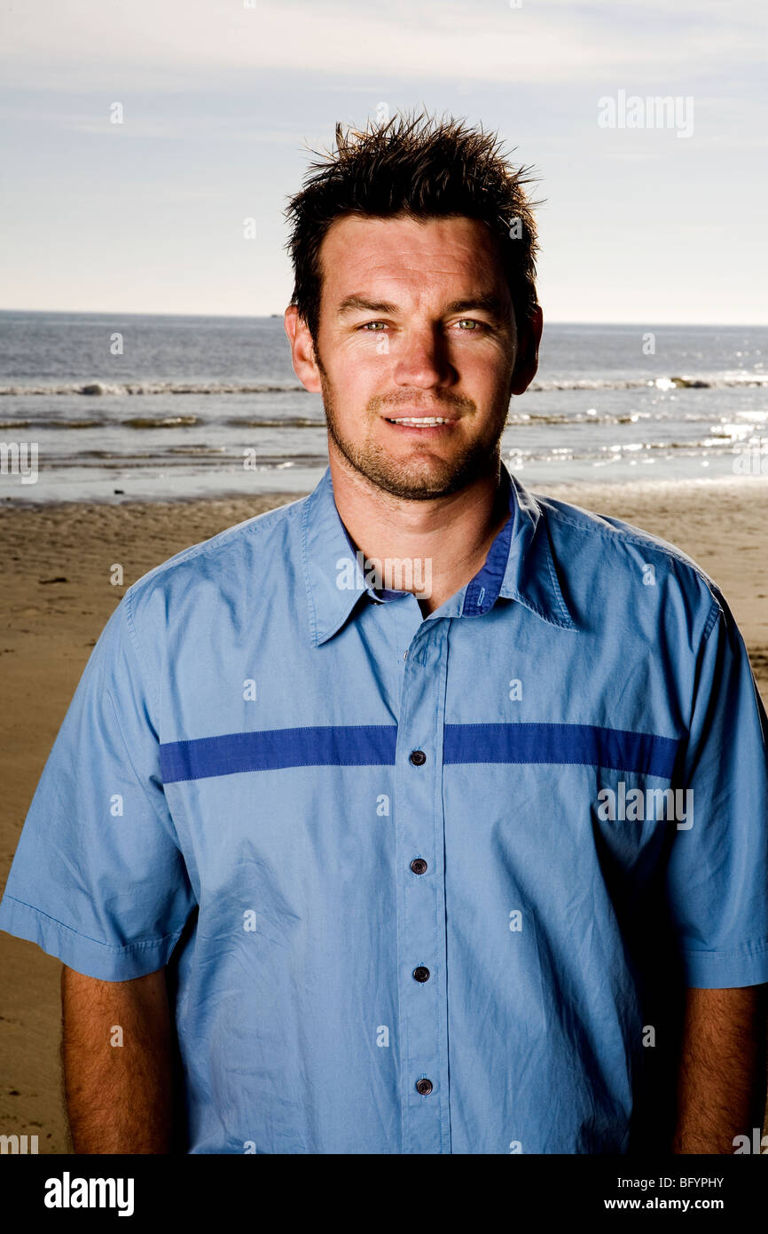 Mid adult man at the beach Stock Photo - Alamy