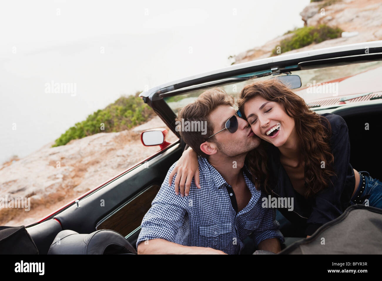 couple kissing in car Stock Photo - Alamy