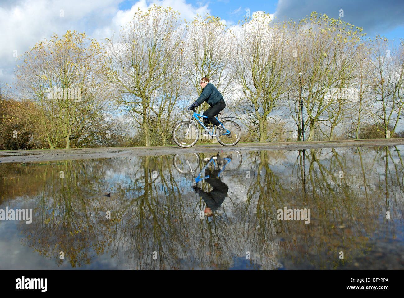 Person riding bicycle Stock Photo - Alamy