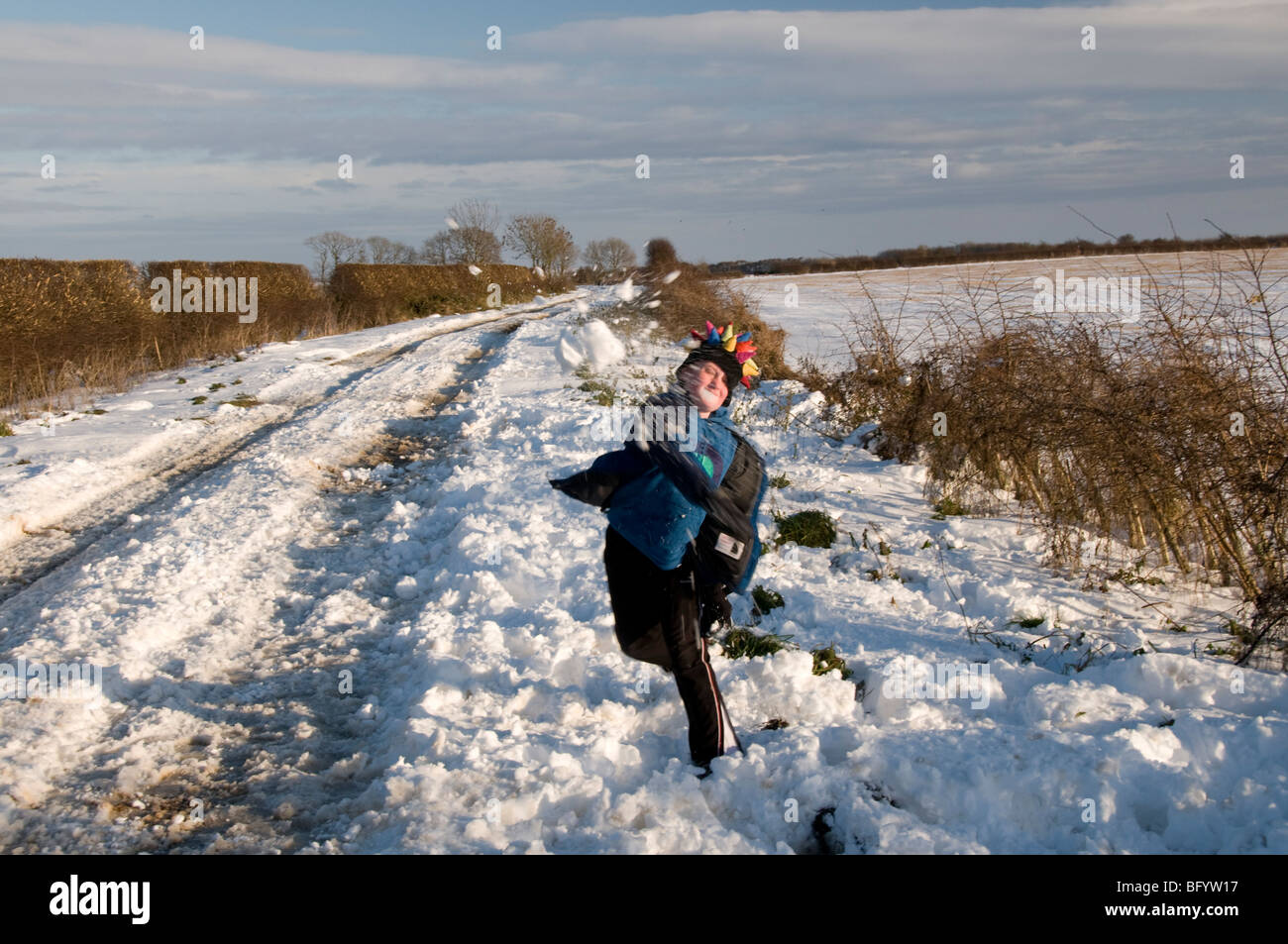 Throwing a snowball hi-res stock photography and images - Alamy