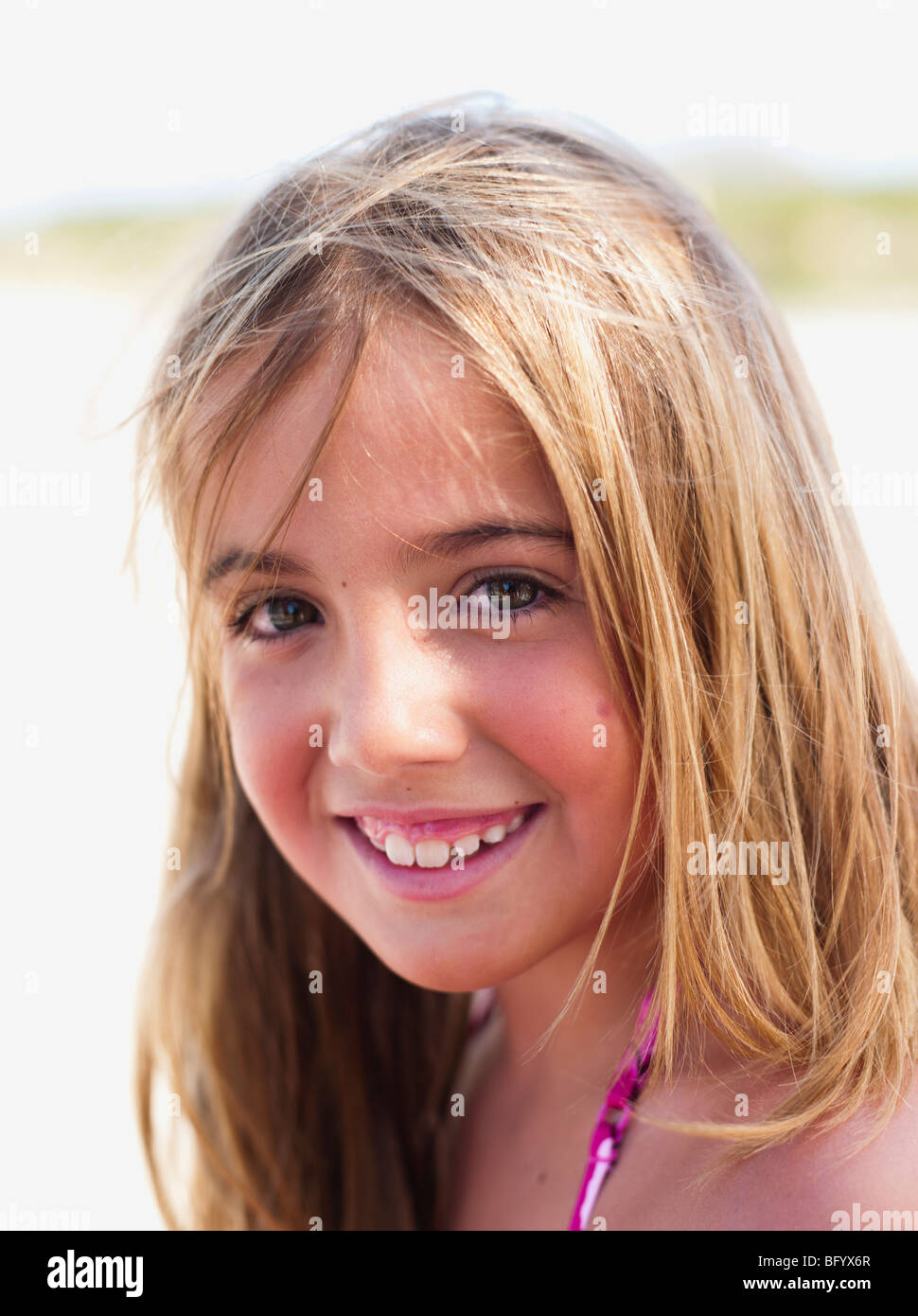 Young Girl Smiling At Viewer Stock Photo Alamy