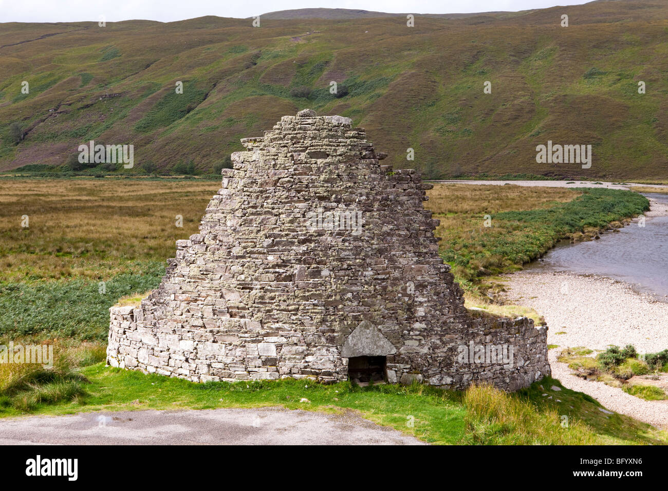 Dun Dornaigil Broch, a small Iron Age dry stone tower in Strath More ...