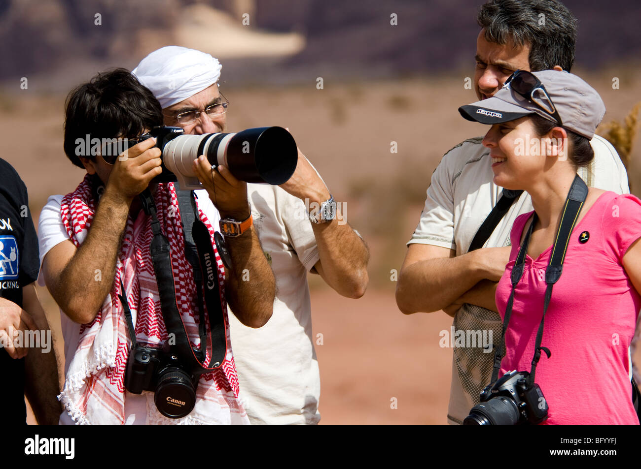 Photographers in action in Jordan Stock Photo - Alamy