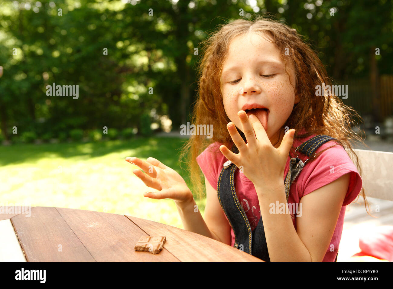 Smart girl alone at home Stock Photo - Alamy