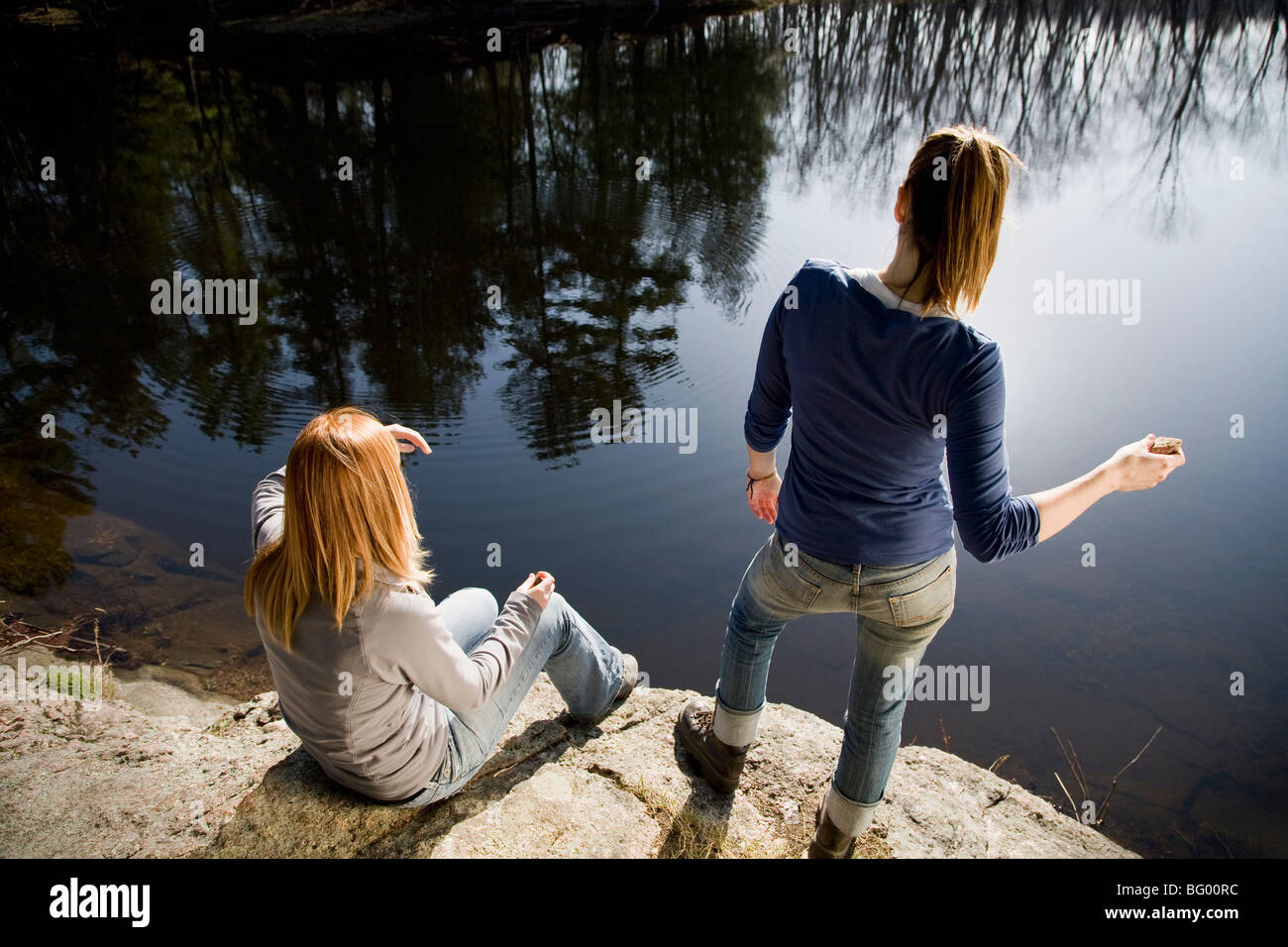 Throwing rocks in water hi-res stock photography and images - Alamy