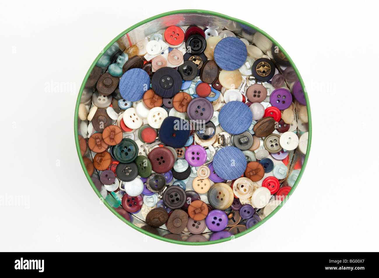 Button tin containing a variety of different coloured buttons from ...