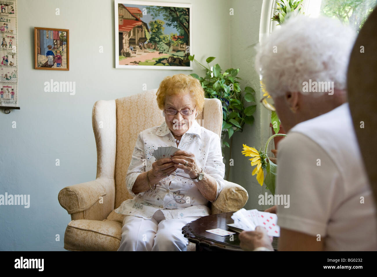 Mature ladies playing cards together Stock Photo - Alamy