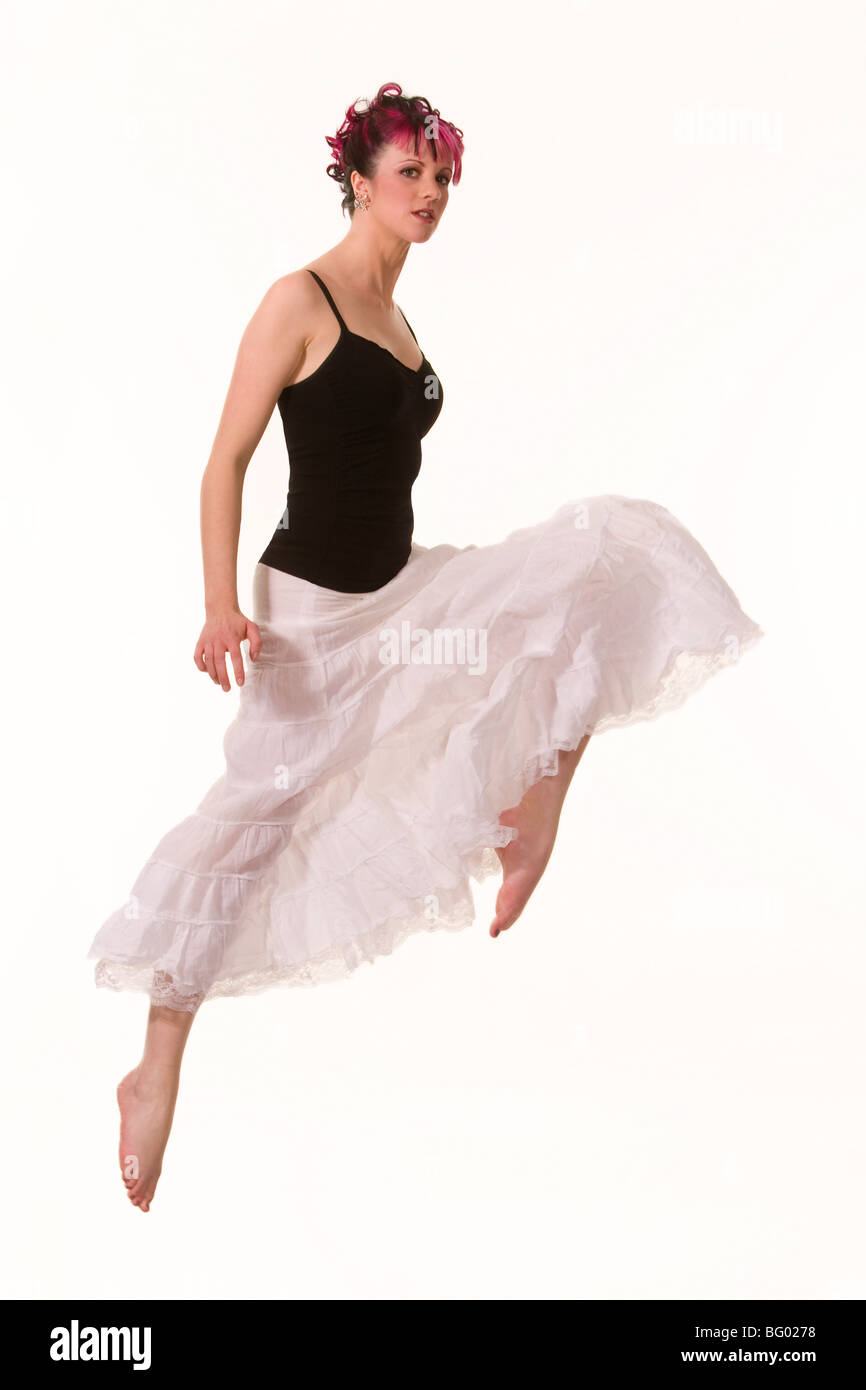 Young woman jumping Stock Photo - Alamy