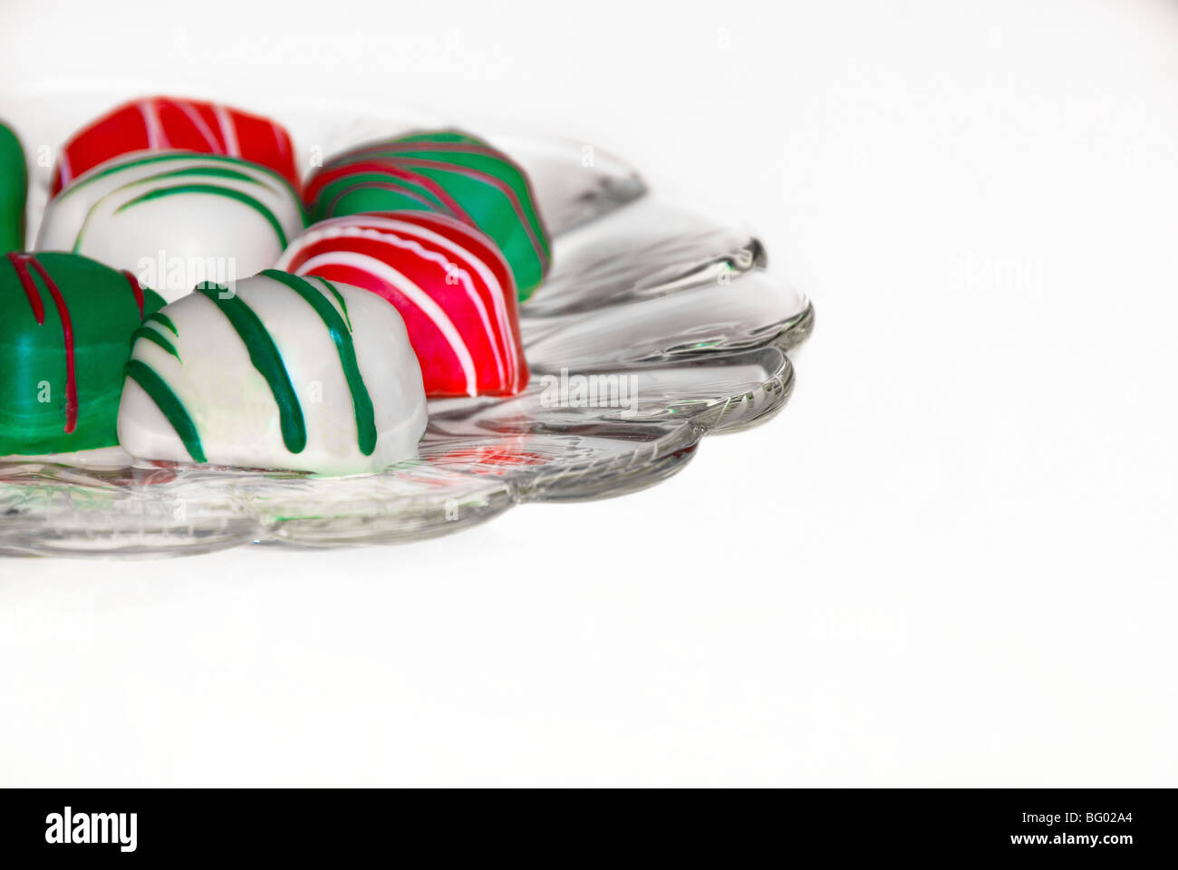 Colorful holiday candy in dish, studio shot Stock Photo - Alamy