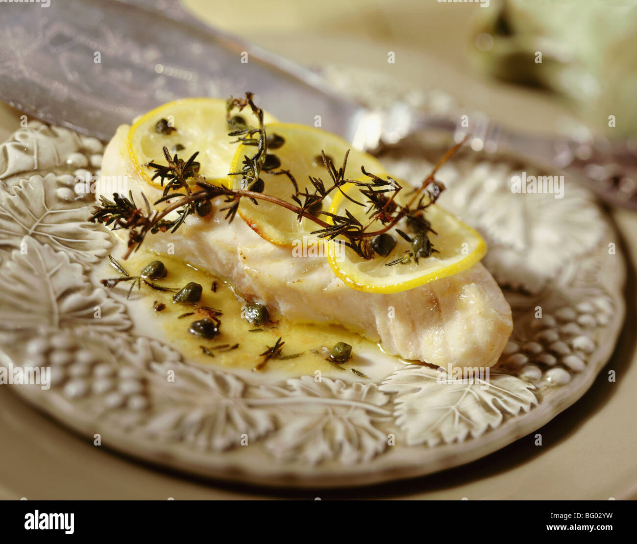 Whitefish in lemon caper sauce Stock Photo - Alamy