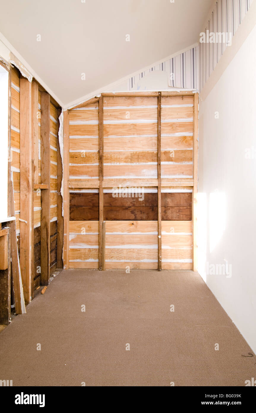 Room being renovated with exposed wood panels Stock Photo - Alamy